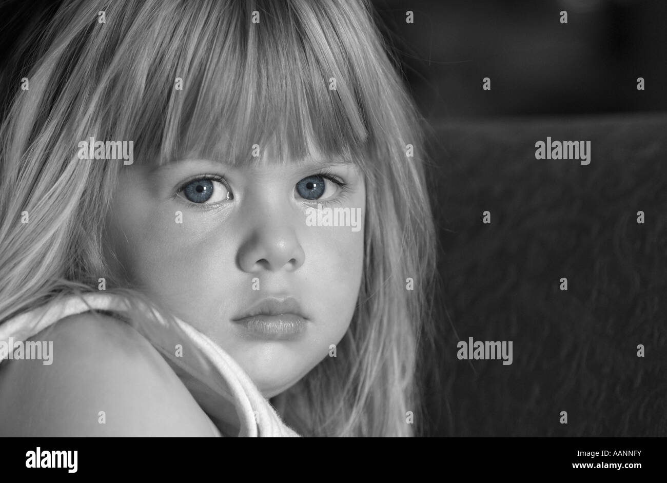 Young child '3' looking vunerable Stock Photo - Alamy