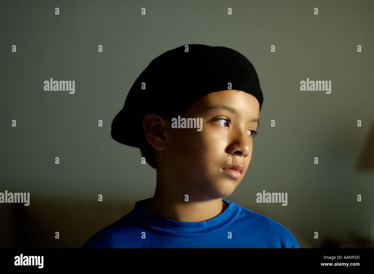 Portrait of a 9 years old boy Tears rolling down his face Stock Photo ...