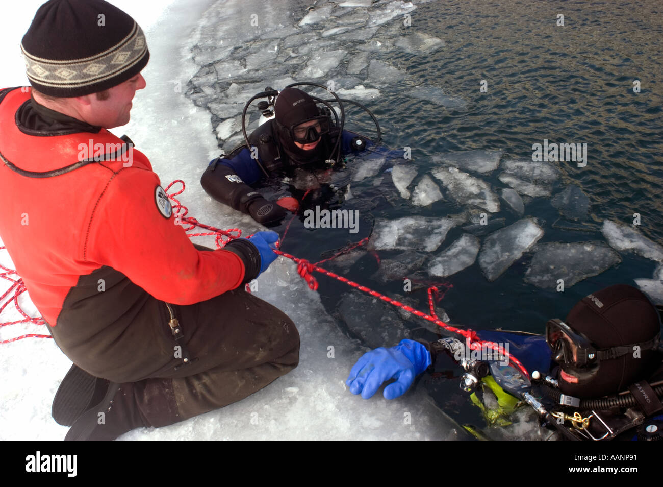 Canadian Graham Dickson acts as surface safty to two divers in the ...
