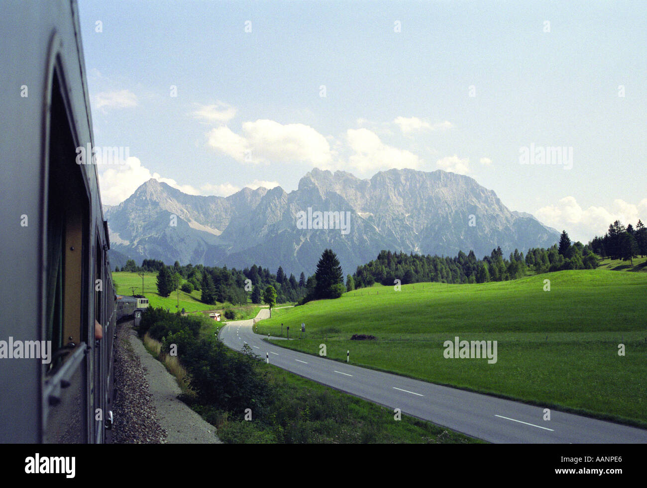 Train heading into the Austrian Alps from Bavaria Germany Austria Stock ...