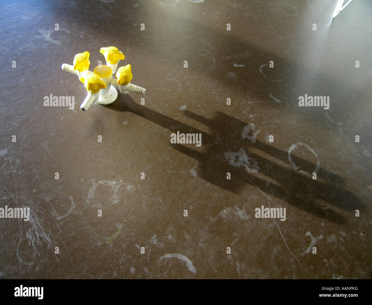 Gas taps on school science department bench Stock Photo - Alamy