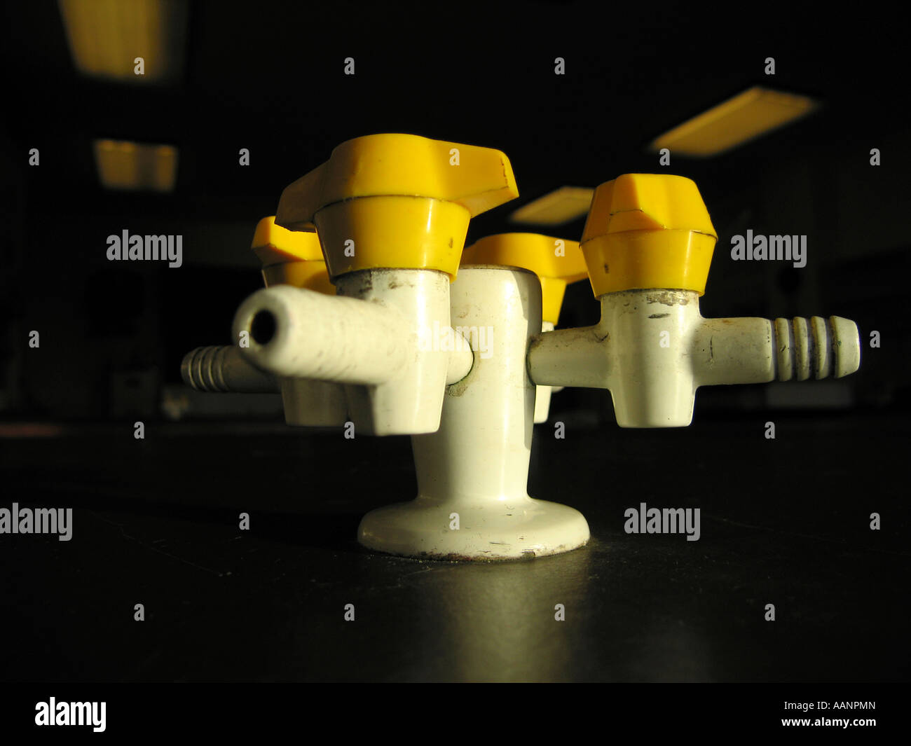 Gas taps on school science department bench Stock Photo - Alamy
