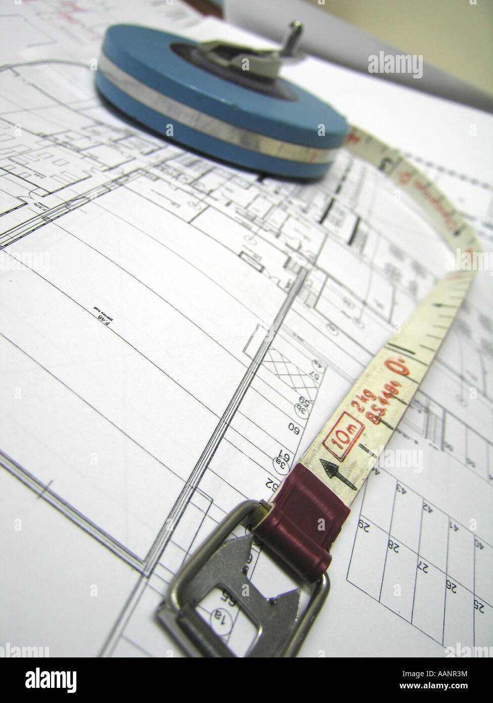 Measuring tape and technical plans Stock Photo - Alamy