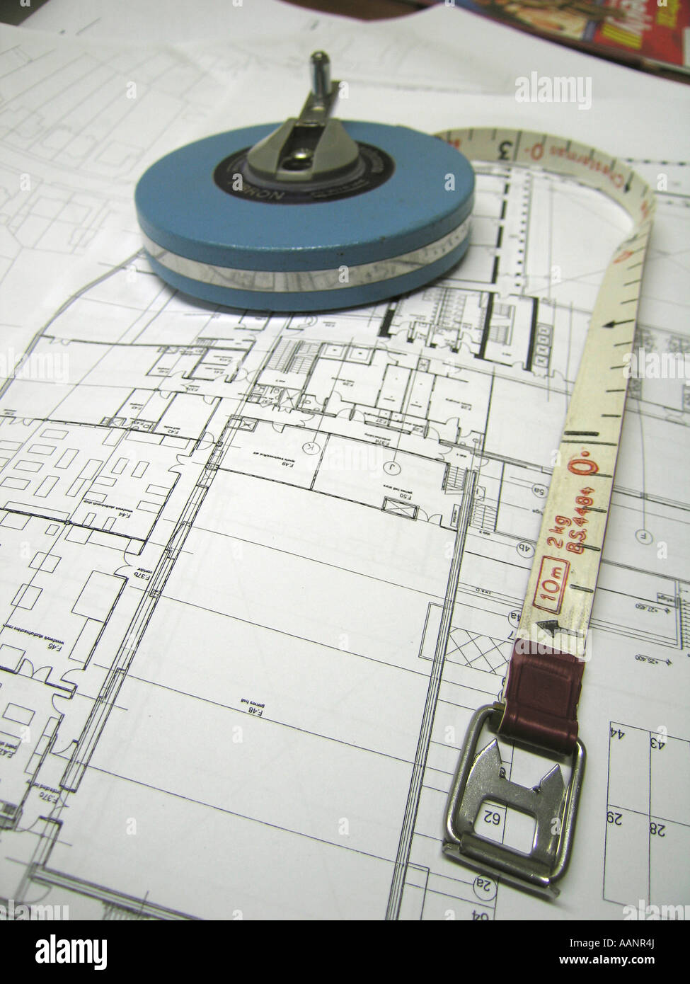 Measuring tape and technical plans Stock Photo - Alamy