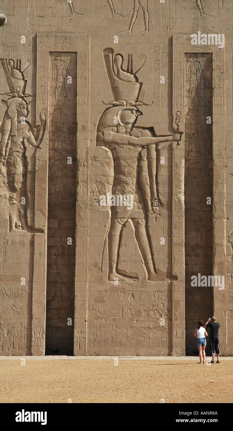 Entrance pylon of the Temple of Horus at Edfu Egypt With tourists to ...