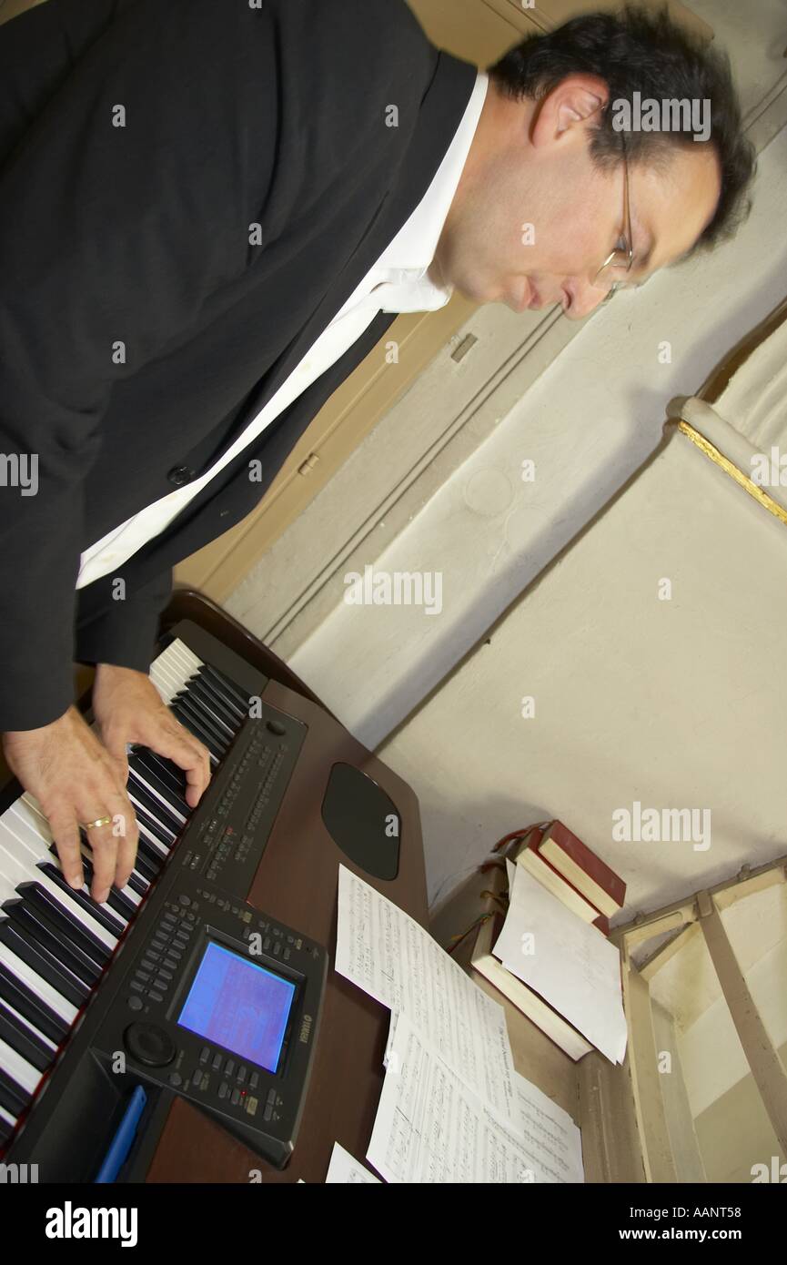 Person playing organ hi-res stock photography and images - Alamy