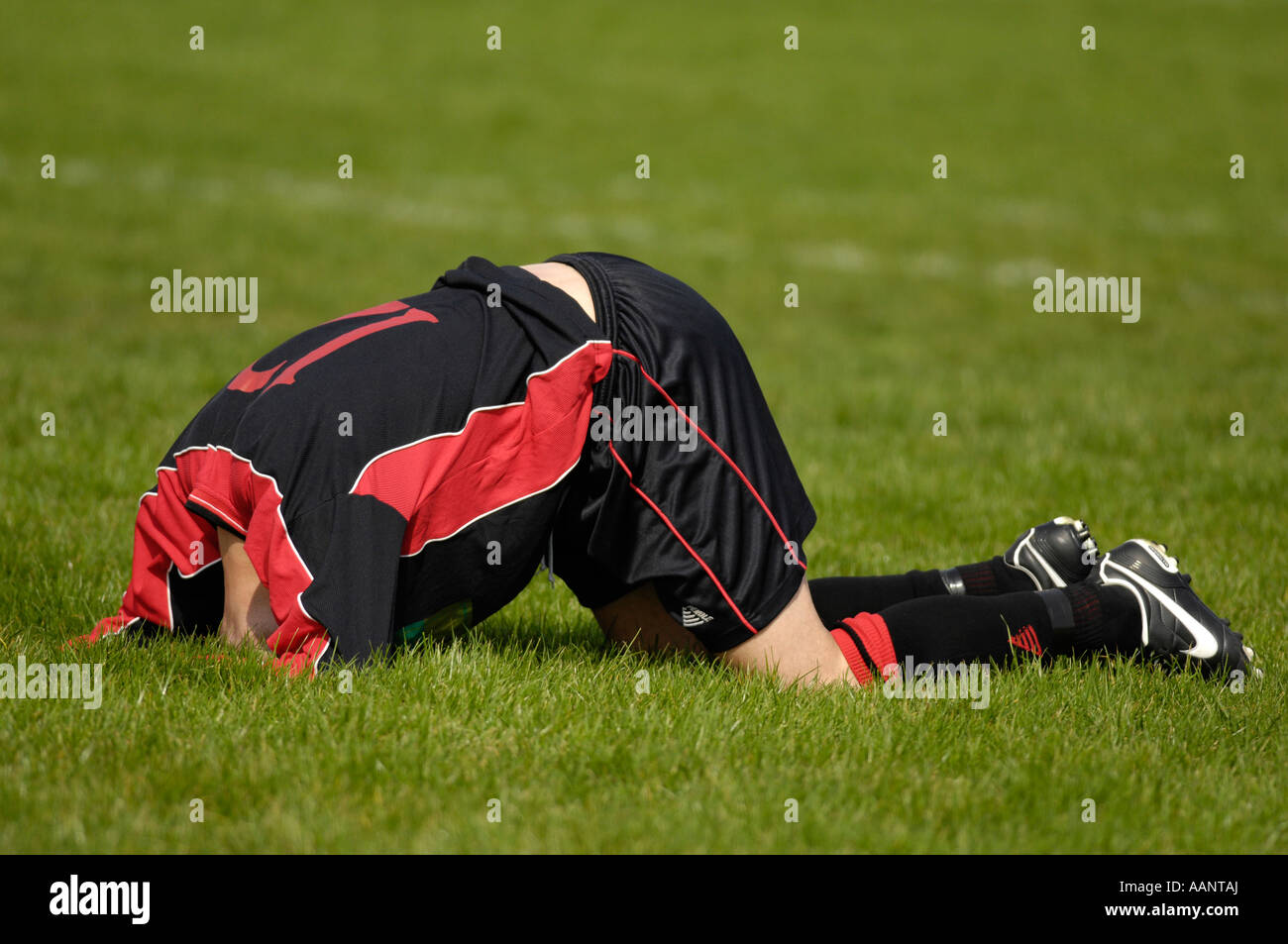 Pain agony football hi-res stock photography and images - Alamy