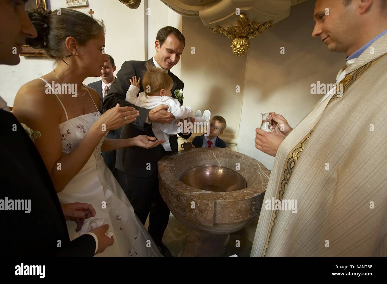 Infant baptism font hi-res stock photography and images - Alamy