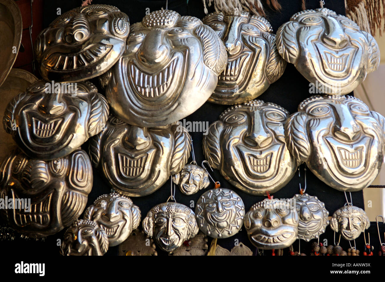 Silver Aymara Bolivian masks for sale in the herb market, La Paz ...