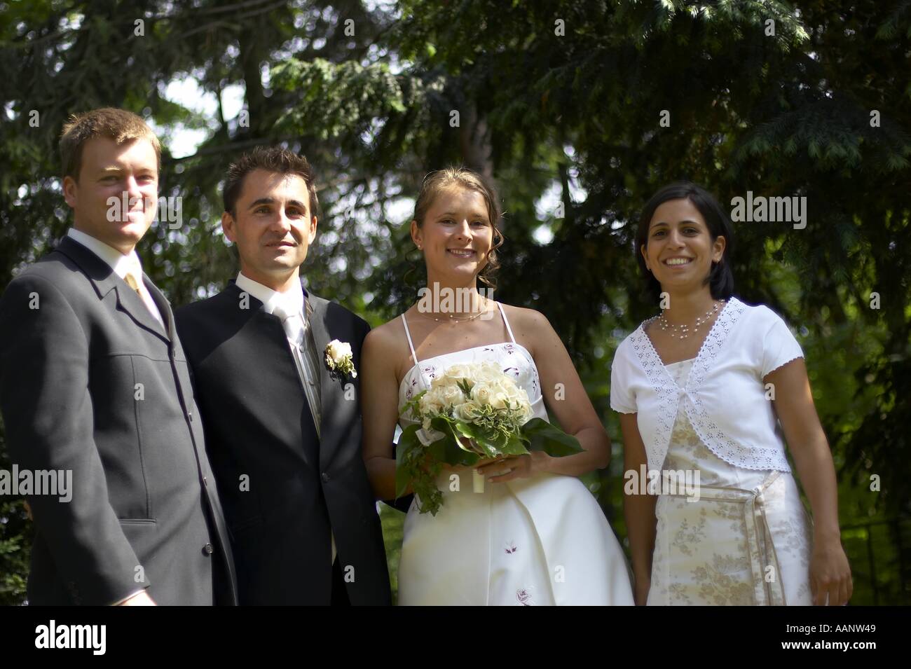 bridal couple with witnesses to marriage Stock Photo - Alamy