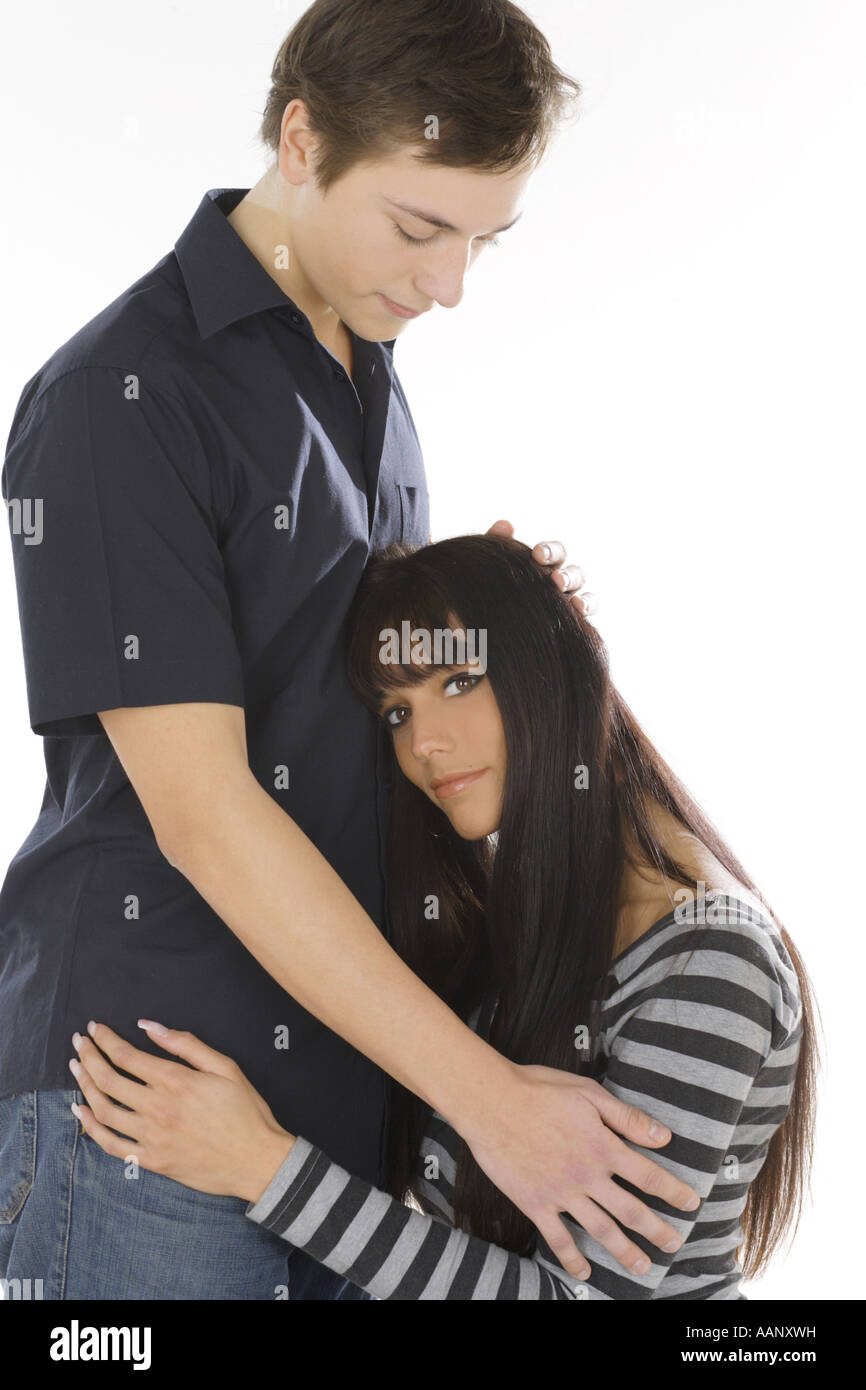 embracing couple, man consoling woman Stock Photo - Alamy