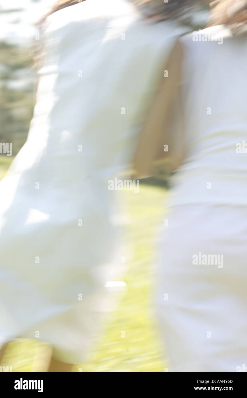 Young women running in park, rear view Stock Photo - Alamy