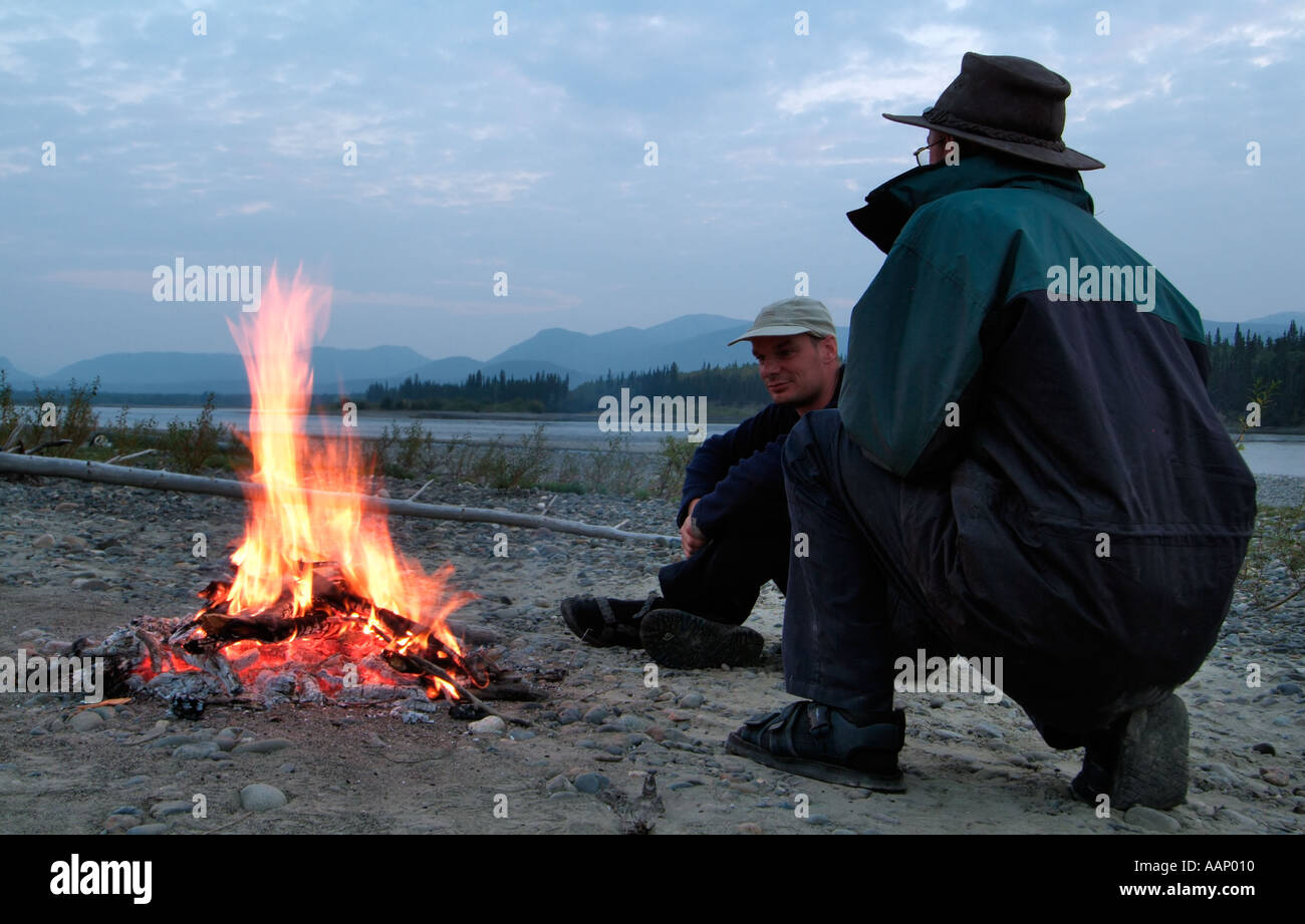 Campfire on a gravel island, Teslin River, Yukon, Canada Stock Photo ...