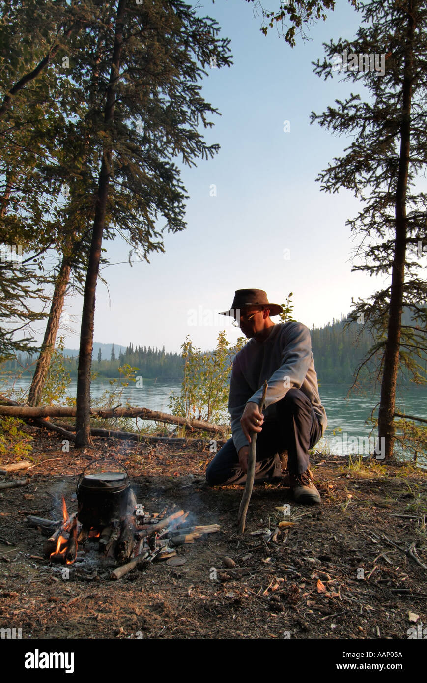 Campfire by the shores of the Yukon River, Yukon, Canada Stock Photo ...