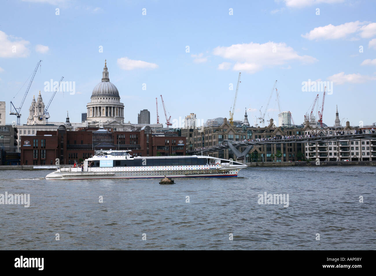 View from Tate Modern of the Tate river boat and St Pauls Cathedral ...