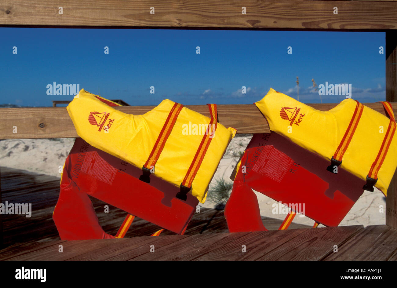 Beach Colorful red yellow life jackets Stock Photo - Alamy