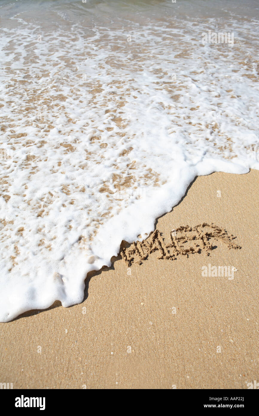 summer written on sand Stock Photo - Alamy
