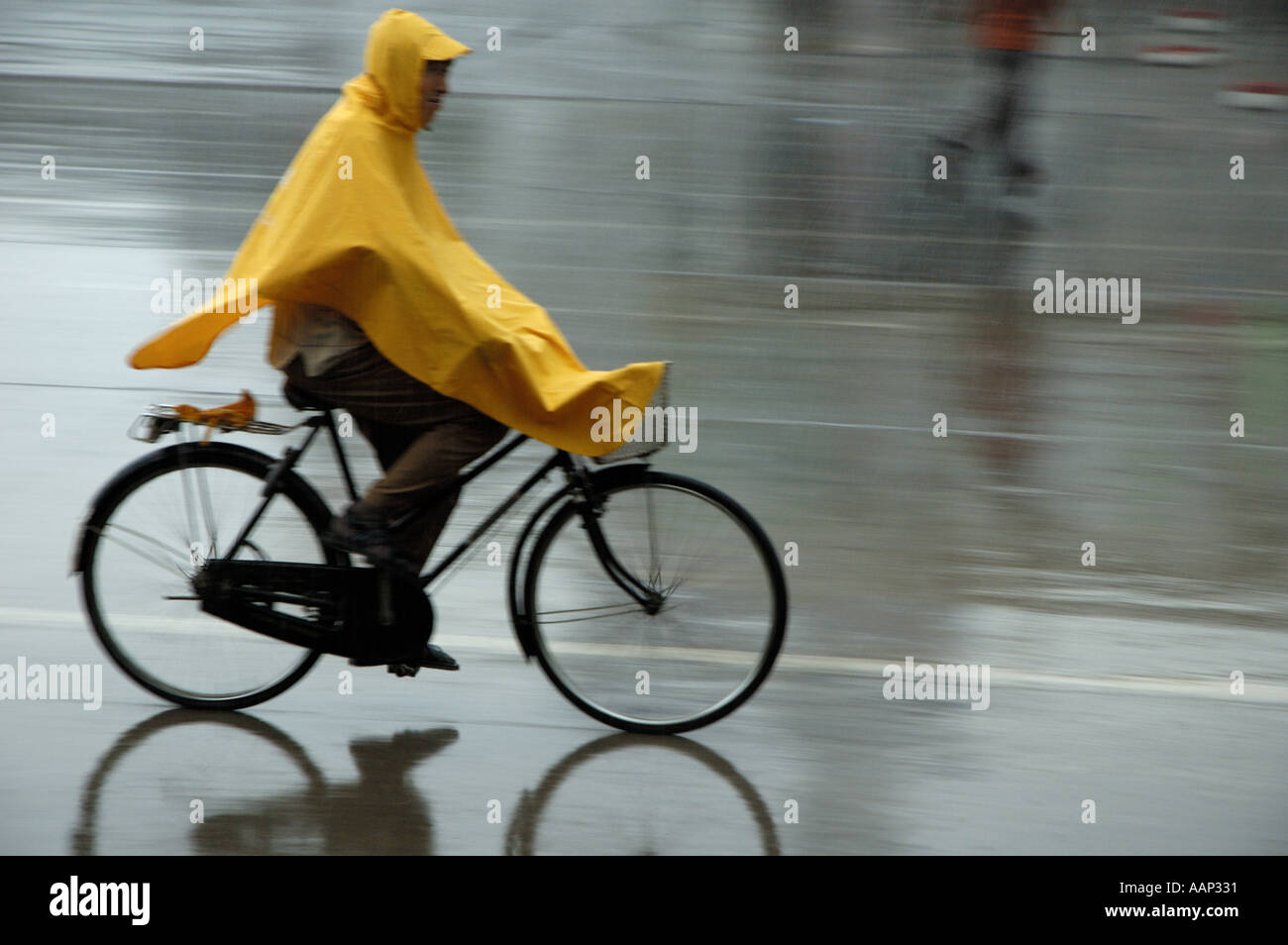 Bike men raincoat hi-res stock photography and images - Alamy