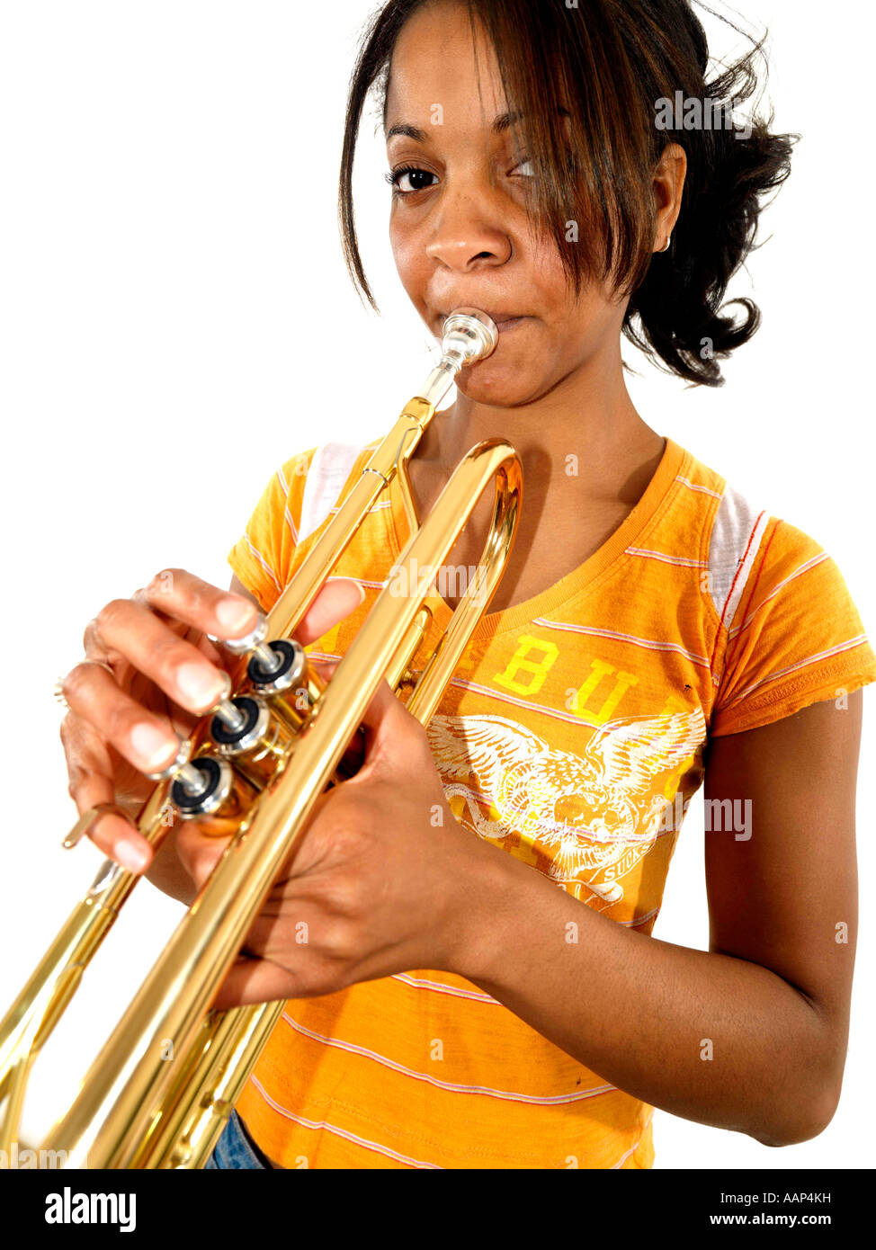 Young woman playing trumpet hi-res stock photography and images - Alamy