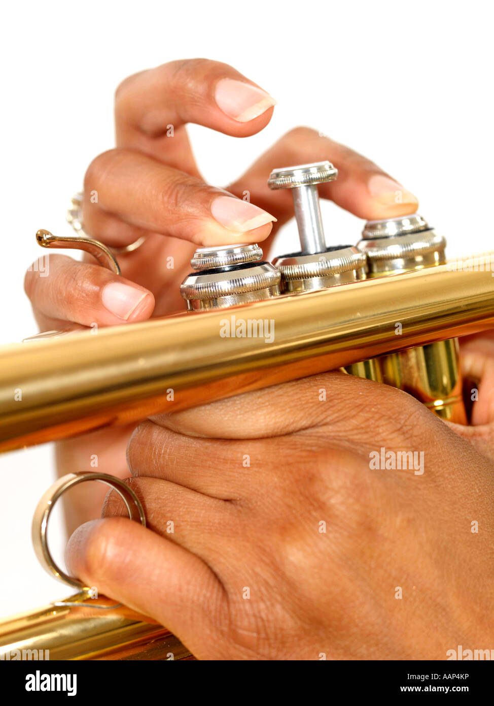 Young Confident Ethnic Woman Playing A Trumpet Isolated Against A White ...