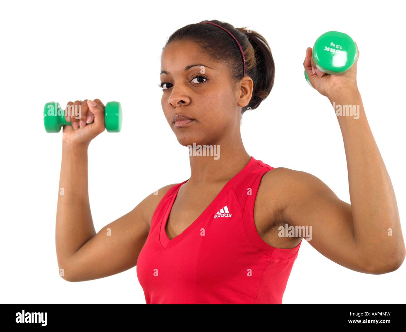 Young Woman Lifting Weights Model Released Stock Photo - Alamy