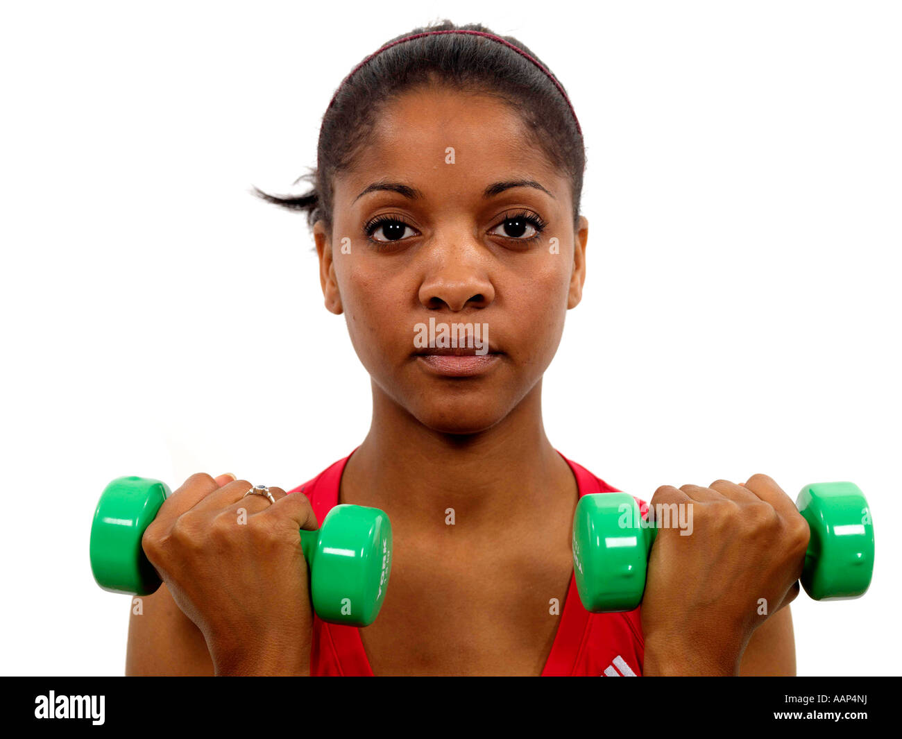 Young Woman Lifting Weights Model Released Stock Photo - Alamy