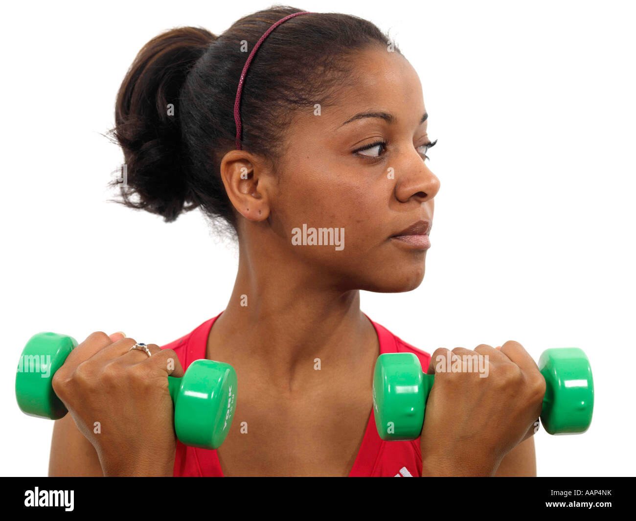 Young Woman Lifting Weights Model Released Stock Photo - Alamy