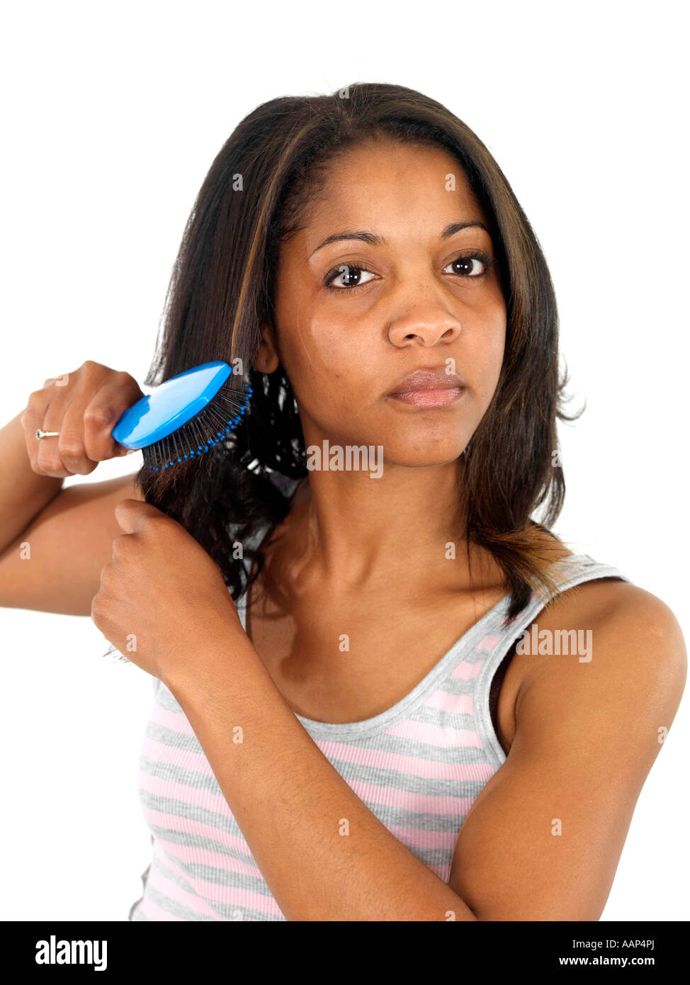 Young Woman Brushing Hair Model Released Stock Photo - Alamy