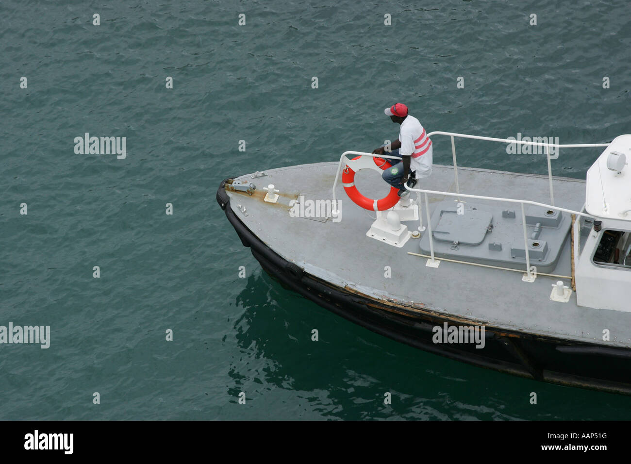 pilot boat ready to guide a a cruise ship into port Stock Photo - Alamy