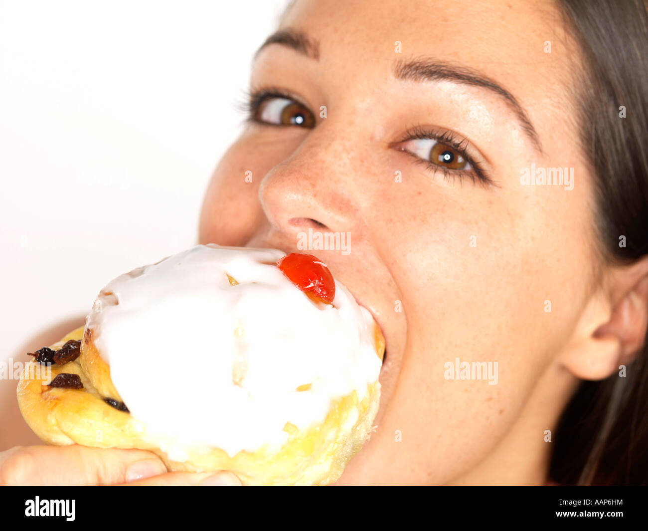 Young Woman Eating Belgian Bun Model Released Stock Photo - Alamy