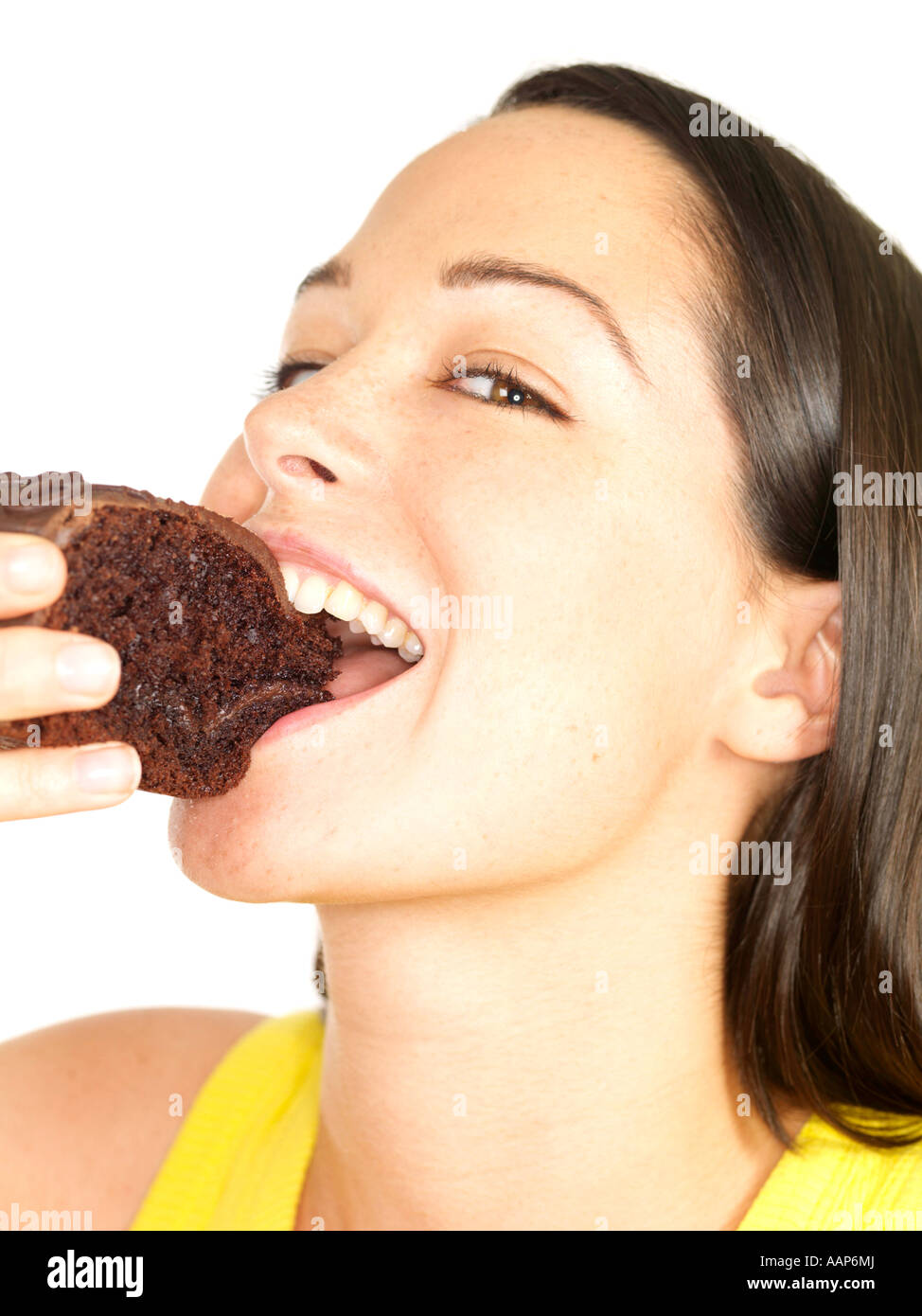 Young Woman Eating Chocolate Fudge Cake Model Released Stock Photo - Alamy