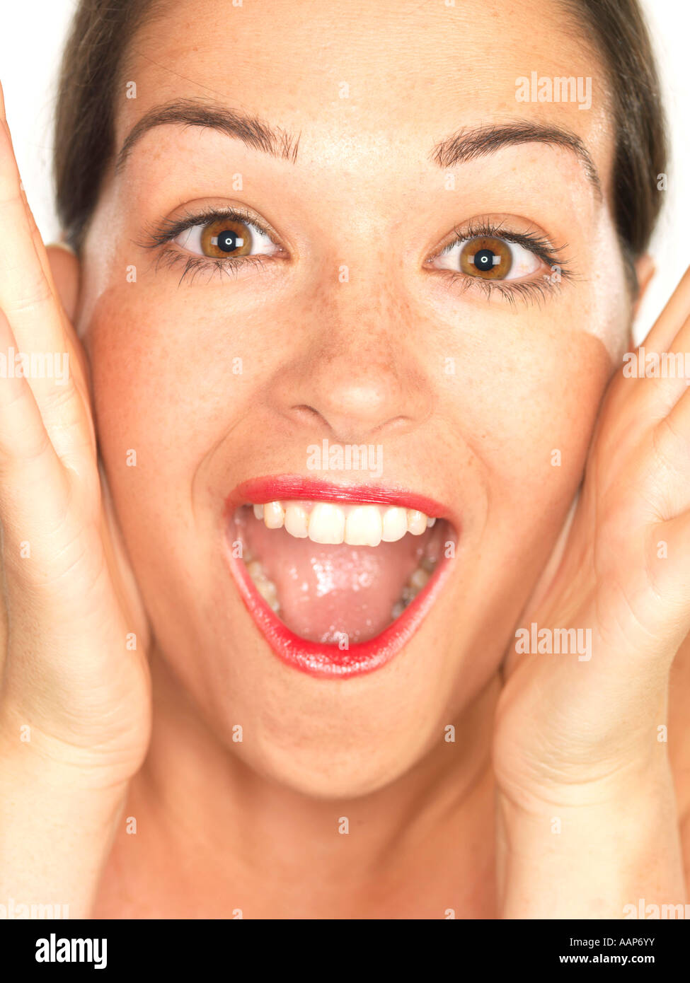 Surprised laughing young woman screaming hi-res stock photography and ...