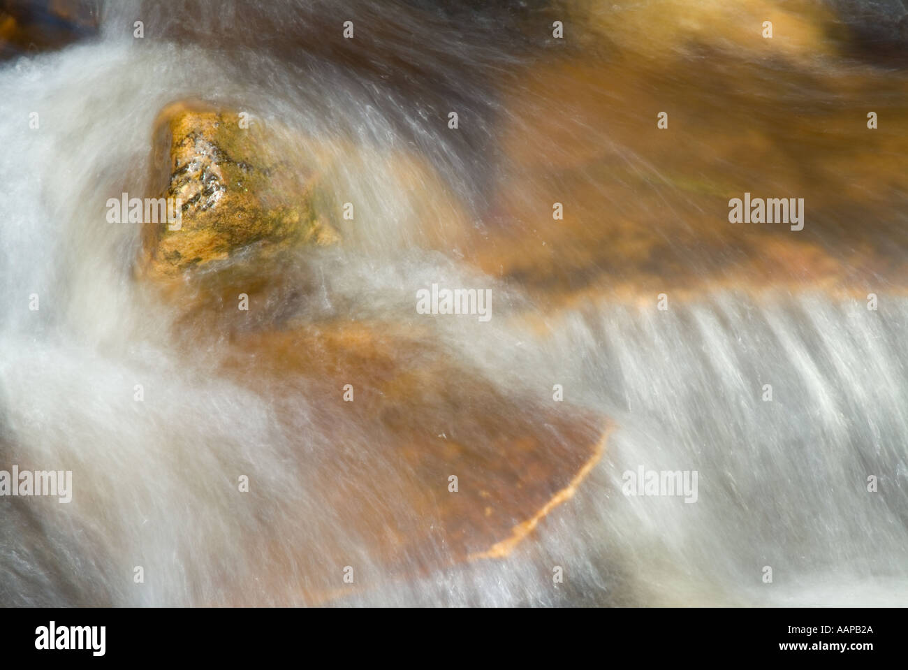 Water flowing over rocks Stock Photo - Alamy