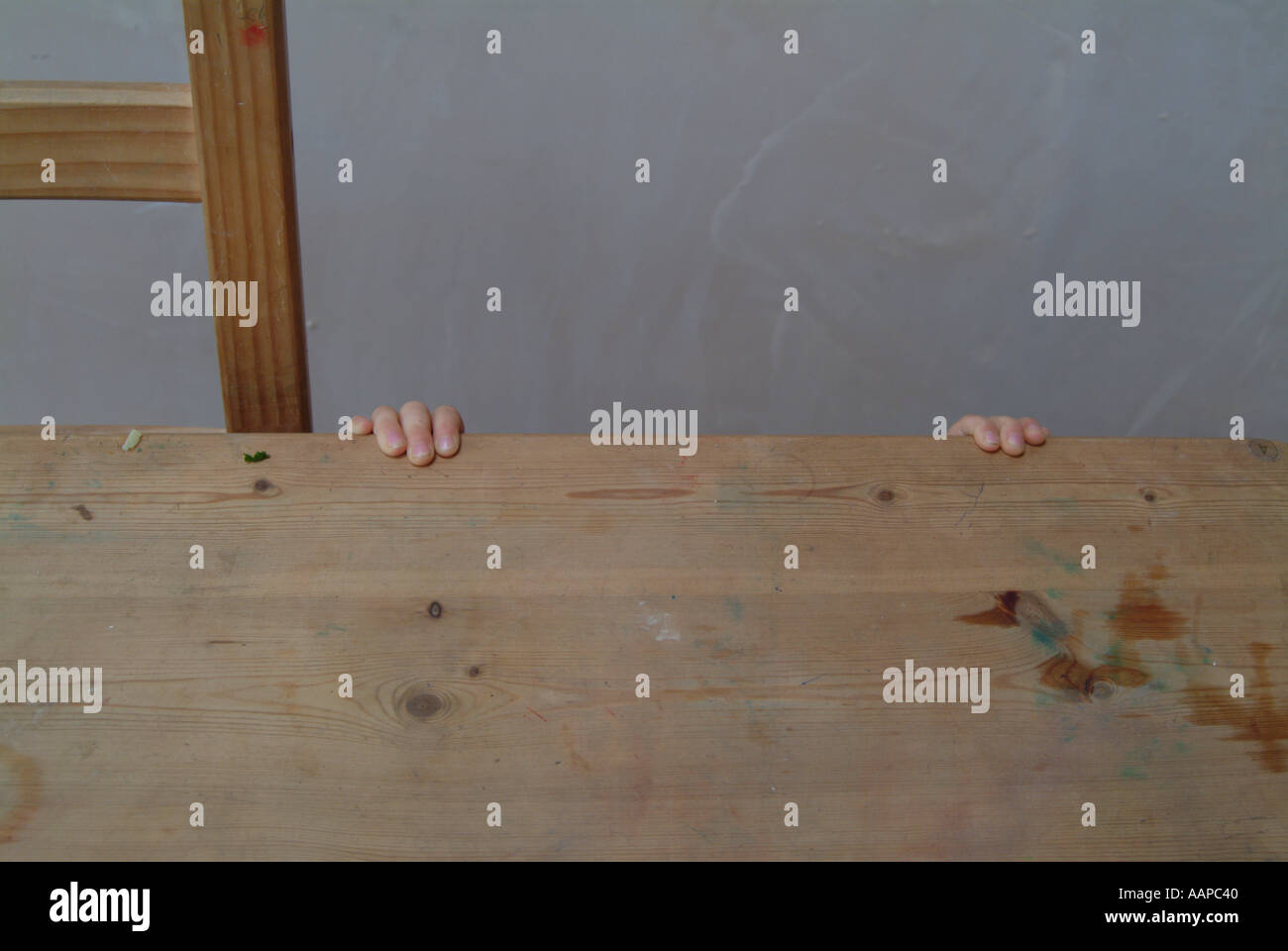 Child hiding under table hi-res stock photography and images - Alamy