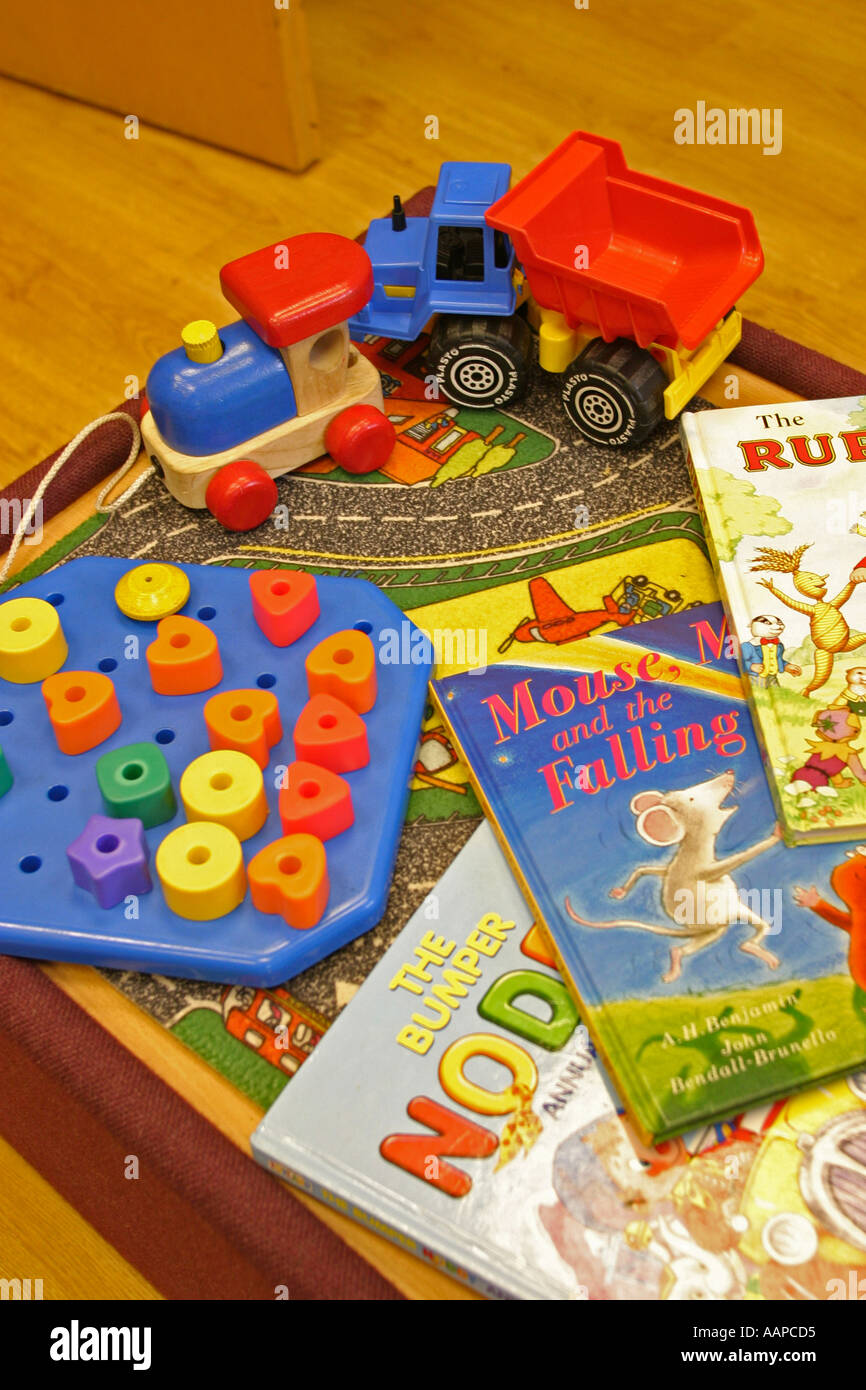 Layout of childrens books and toys Stock Photo - Alamy