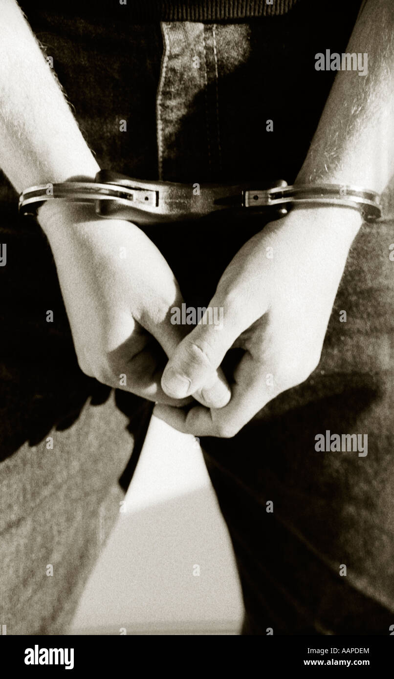 Offender, handcuffed, court hi-res stock photography and images - Alamy