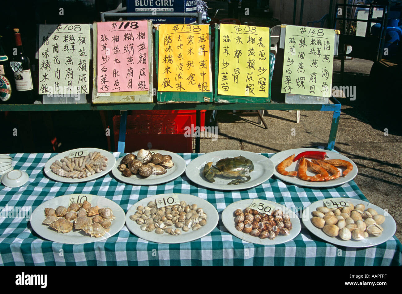 Display of shellfish on plates outside restaurant, Cheung Chau Island ...