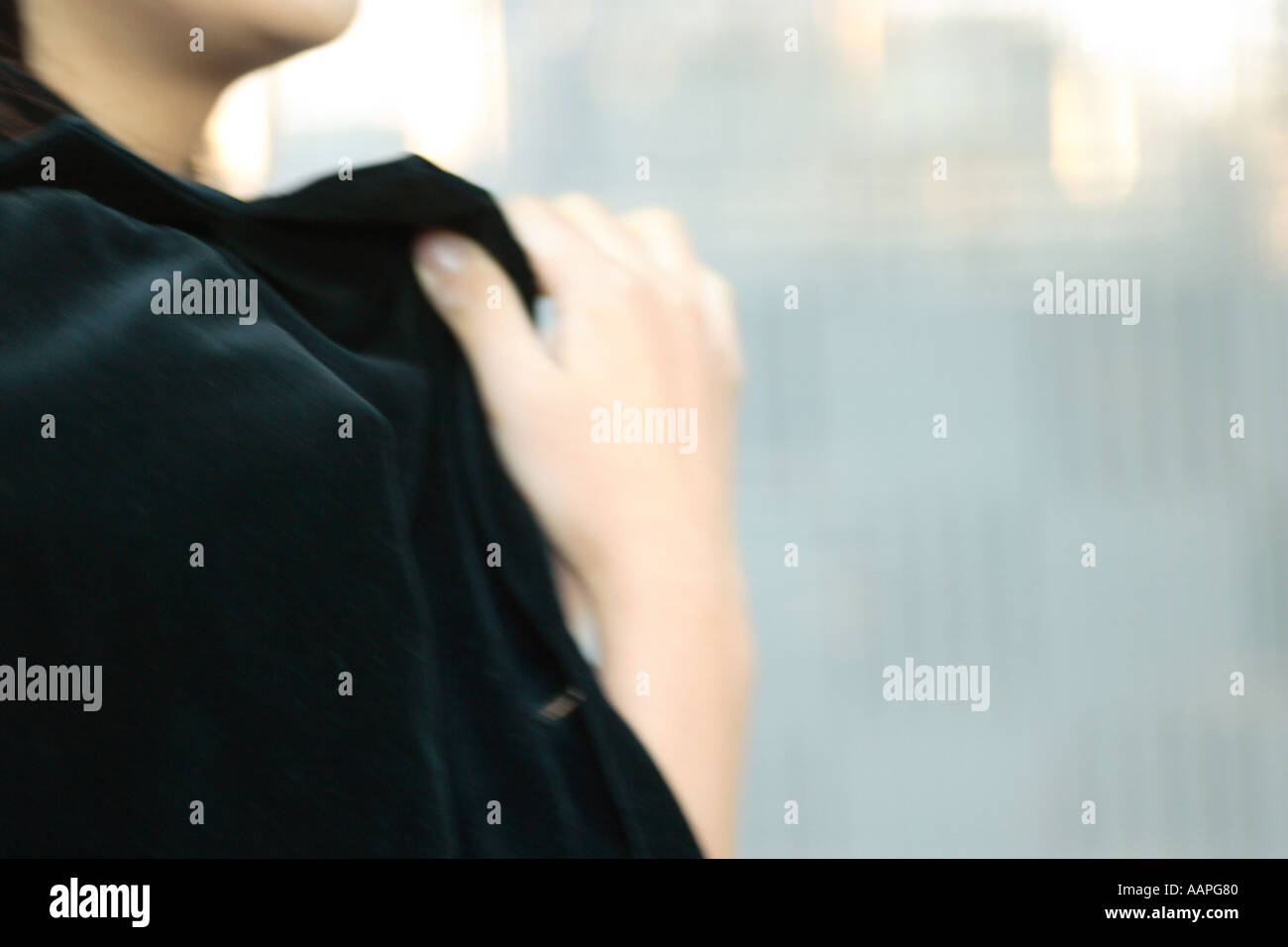 Hand with coat hi-res stock photography and images - Alamy