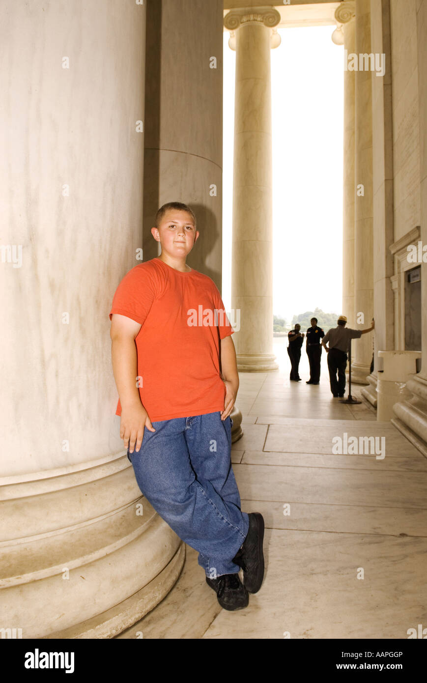 Young Caucasian Boy (11-13) Leaning Against Giant Column at Jefferson ...