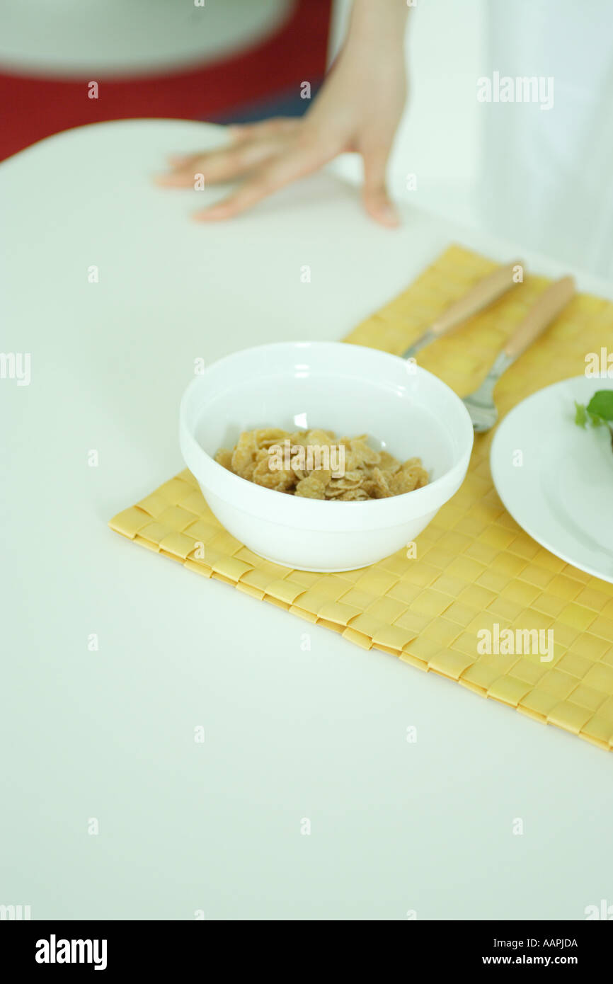 Cereal and a woman's hand Stock Photo - Alamy
