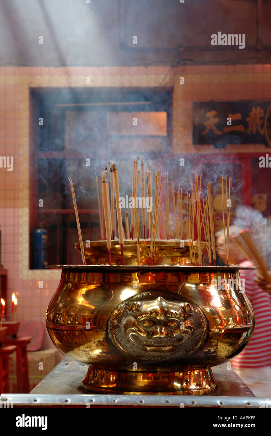 Ray of light shinning on a altar in a smoke filled chinese temple Stock ...