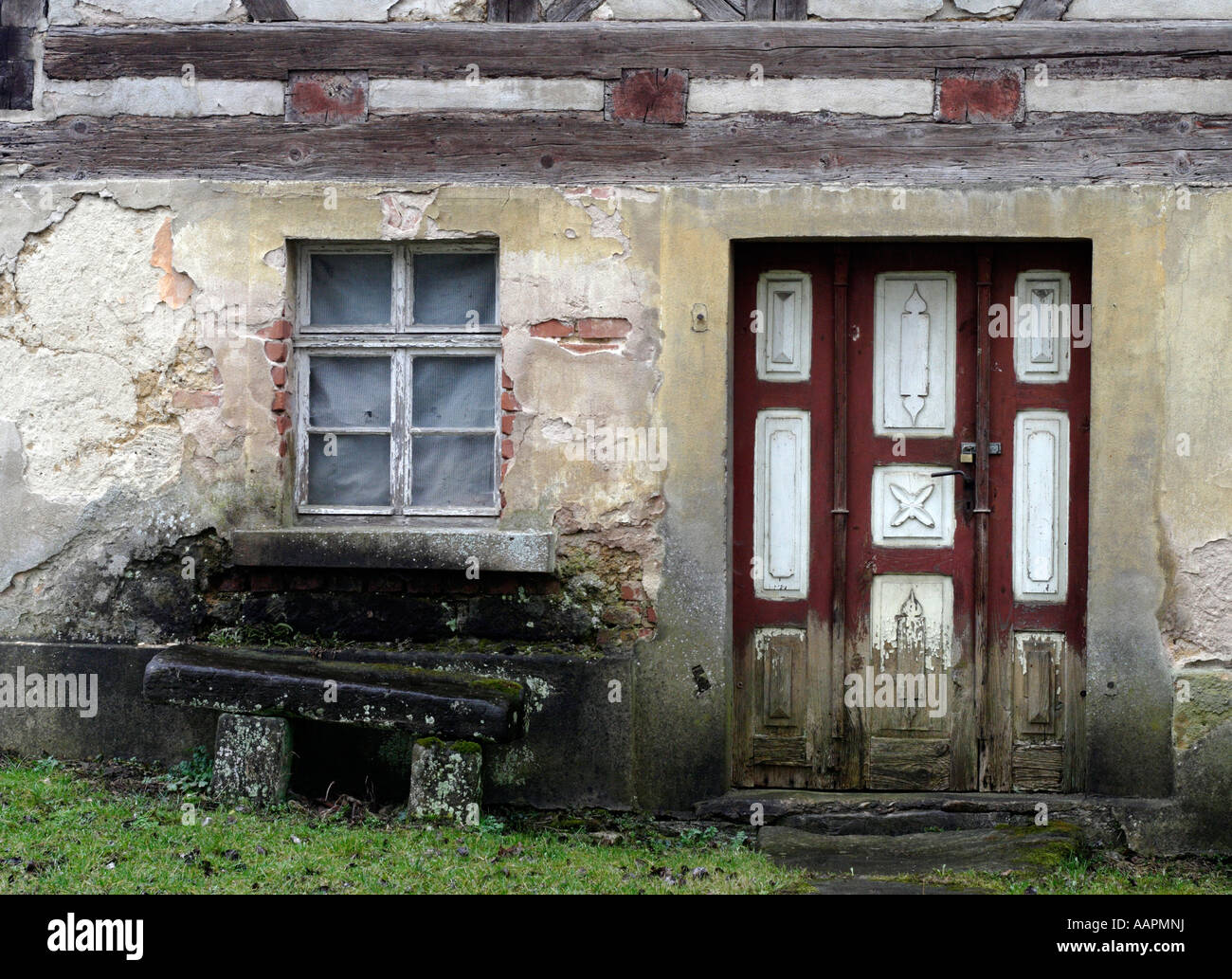 Desolate framework house with bench Stock Photo - Alamy