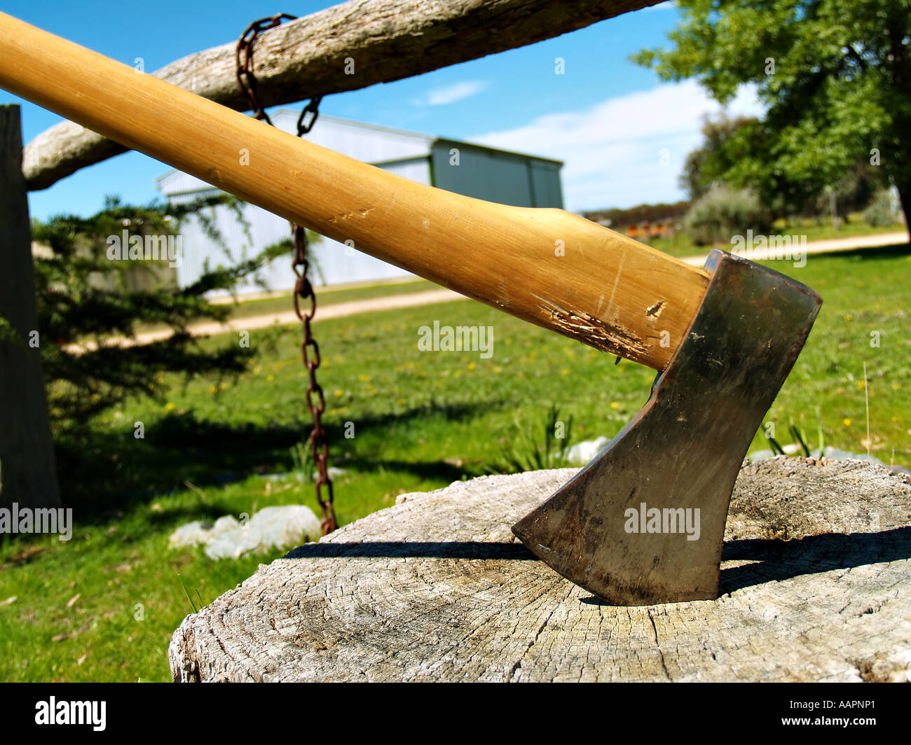 Axe at a farm Stock Photo - Alamy
