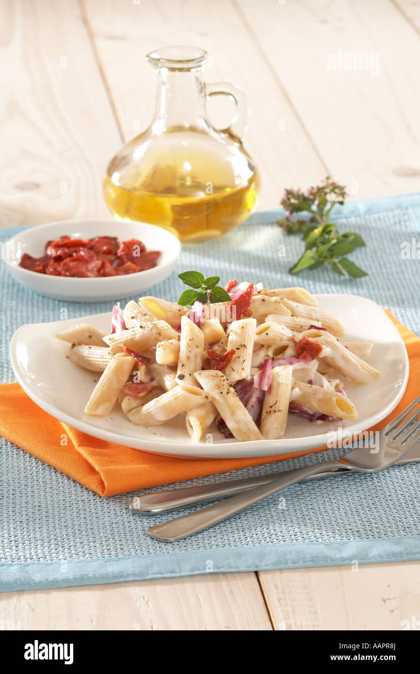 Penne Rigate with Ricotta and Dried Tomatoes Stock Photo - Alamy