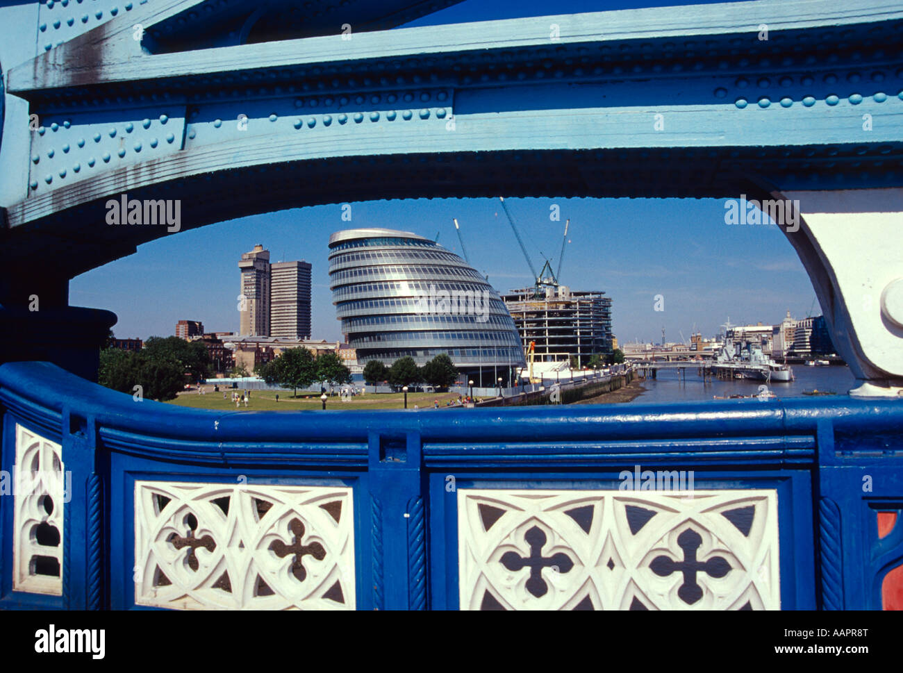 Greater London Assembly at City Hall.through steelwork of tower bridge ...