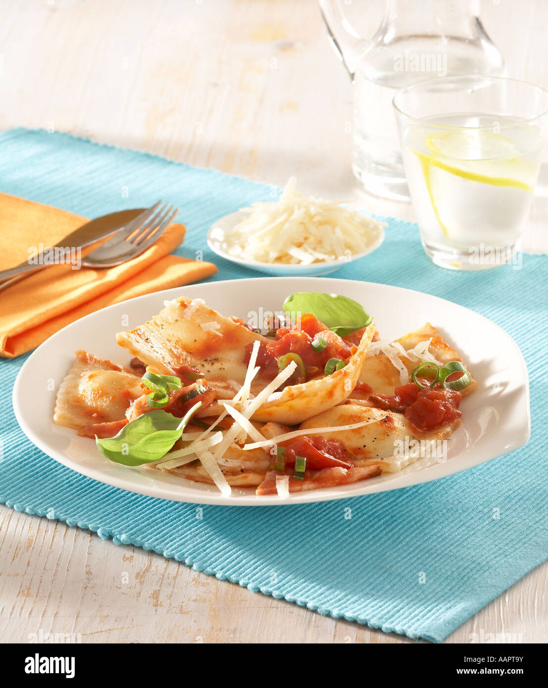 Basil Ravioli with Tomato Sauce Stock Photo - Alamy