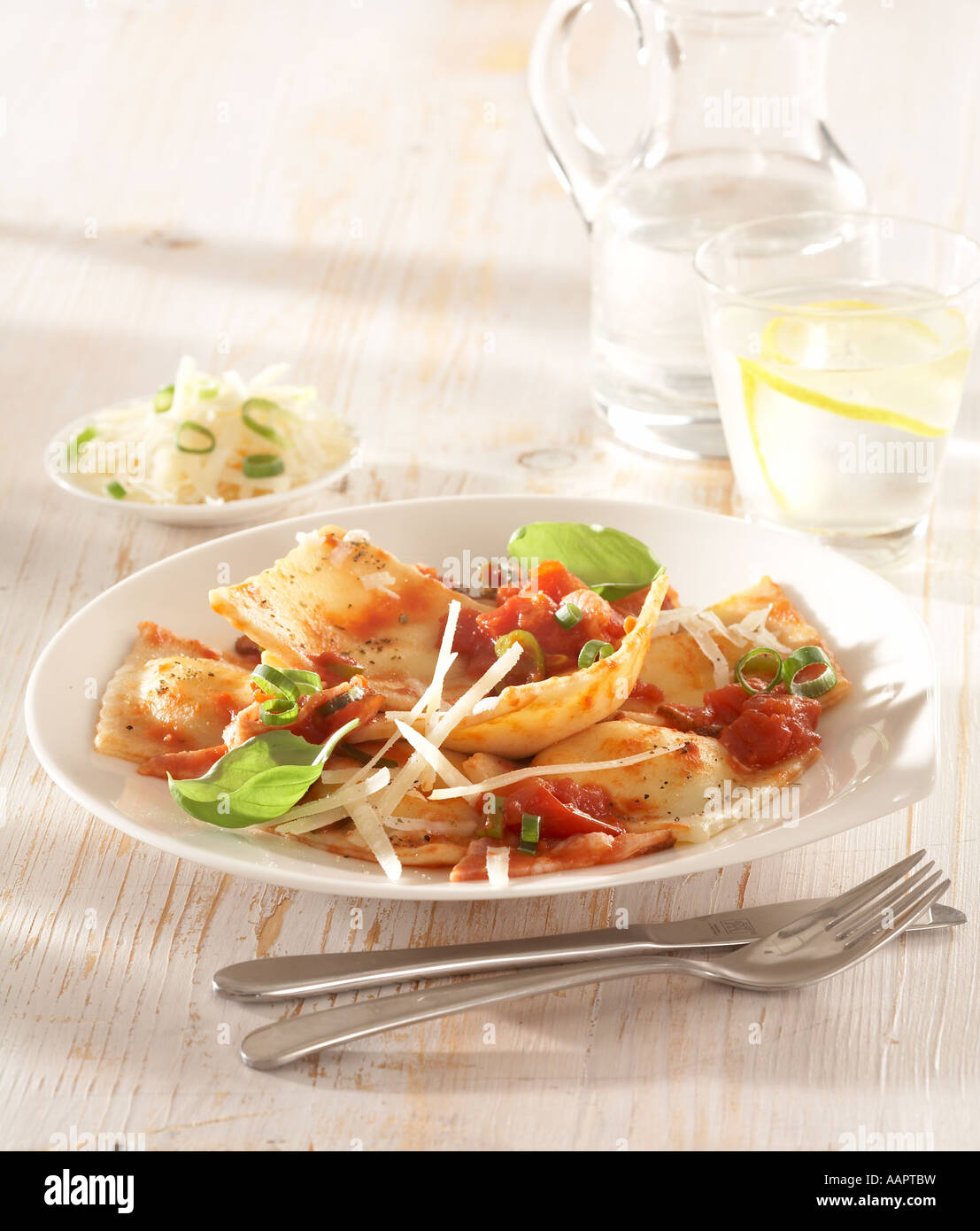 Basil Ravioli with Tomato Sauce Stock Photo - Alamy