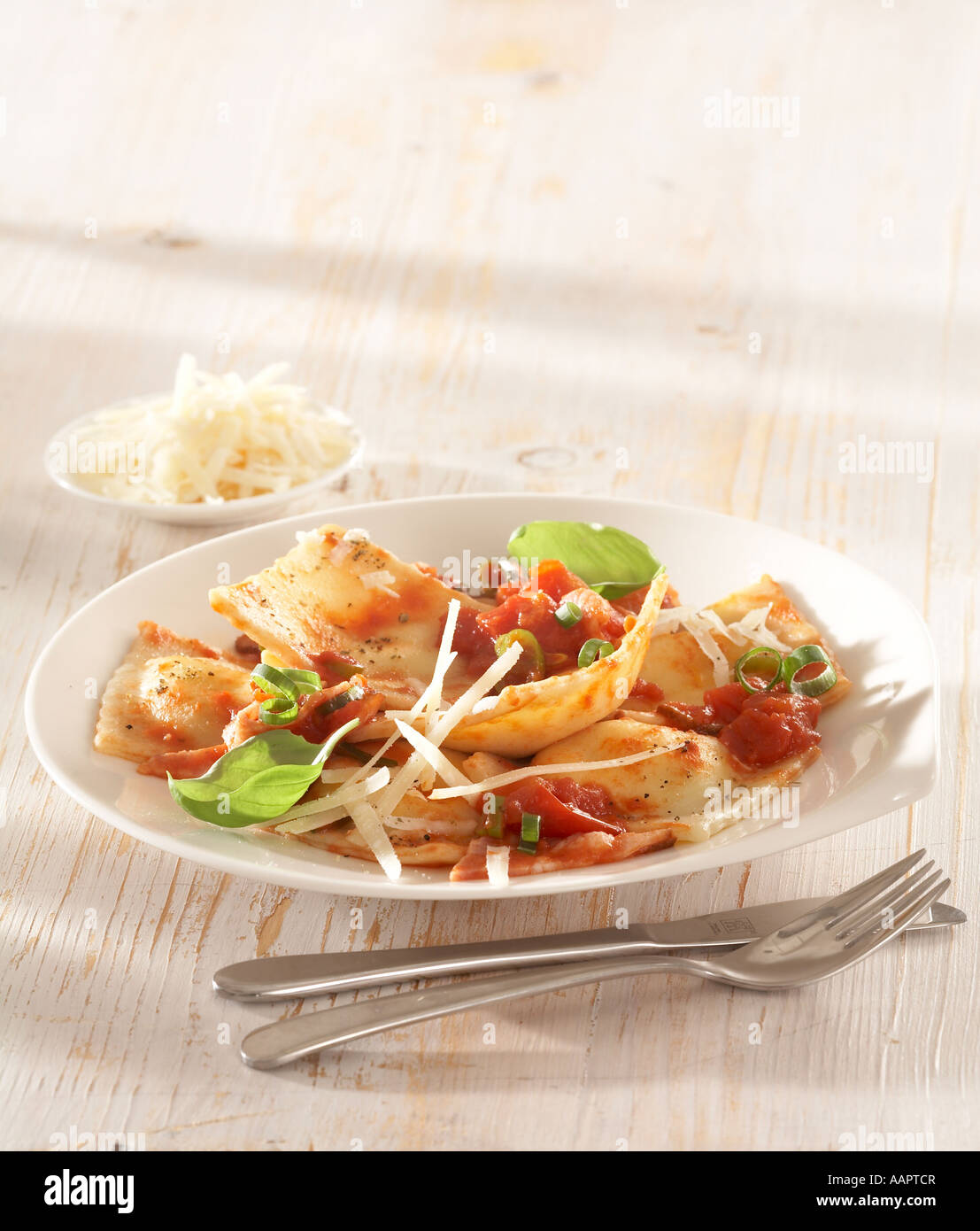 Basil Ravioli with Tomato Sauce Stock Photo - Alamy