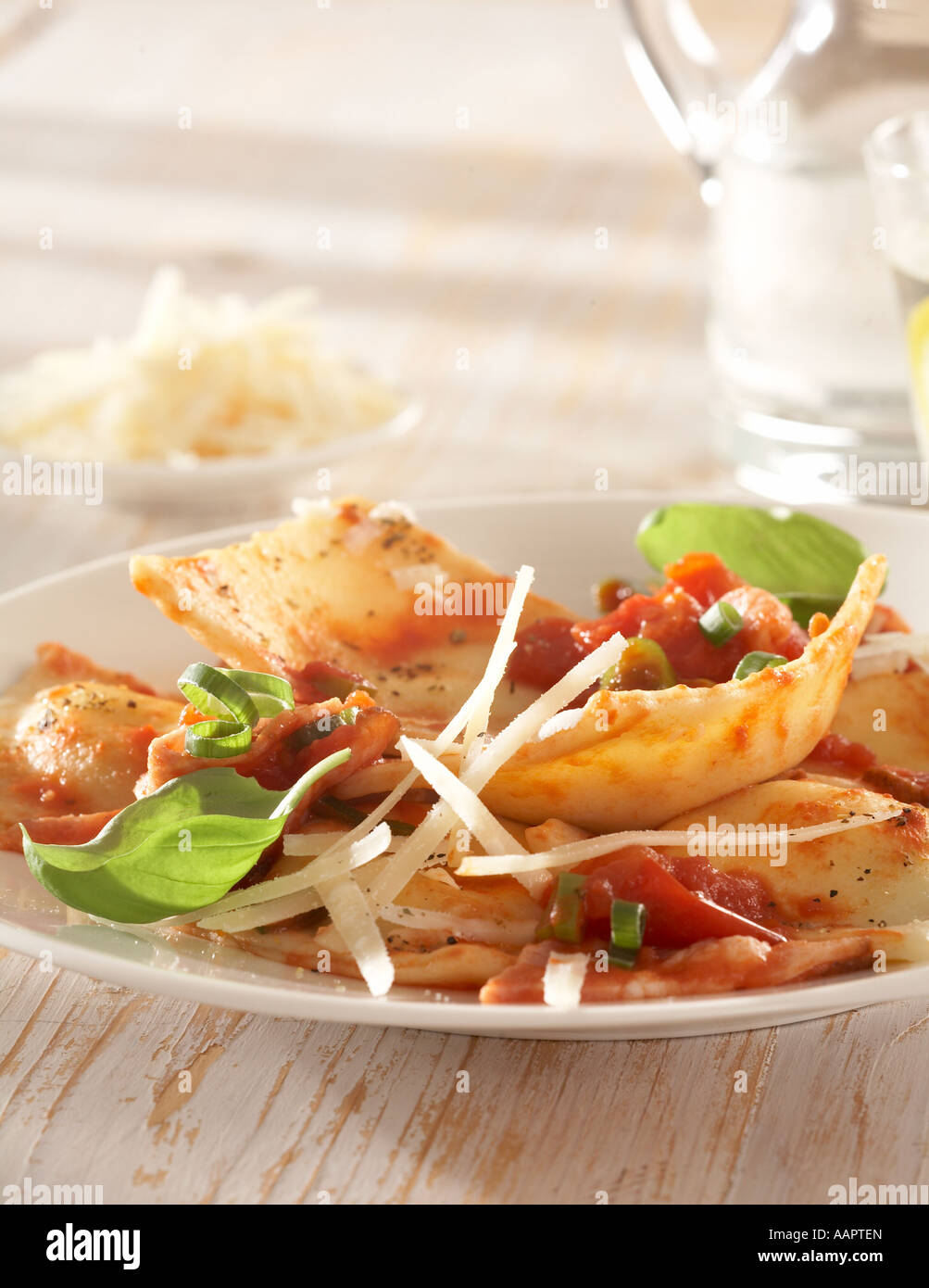 Basil Ravioli with Tomato Sauce Stock Photo - Alamy