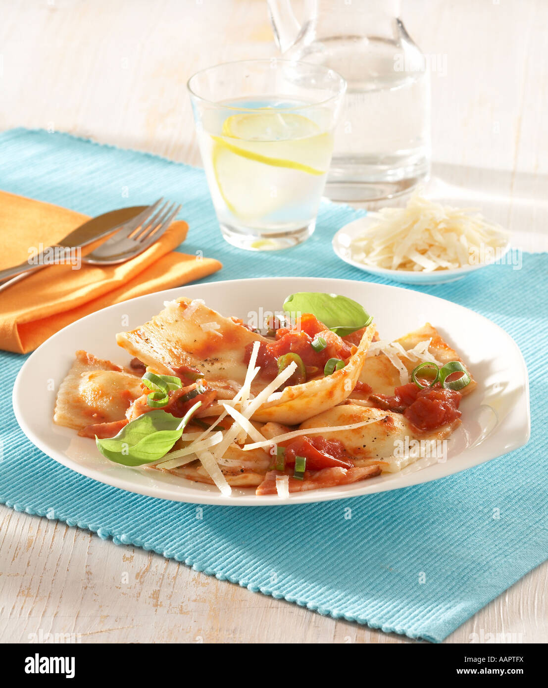 Basil Ravioli with Tomato Sauce Stock Photo - Alamy